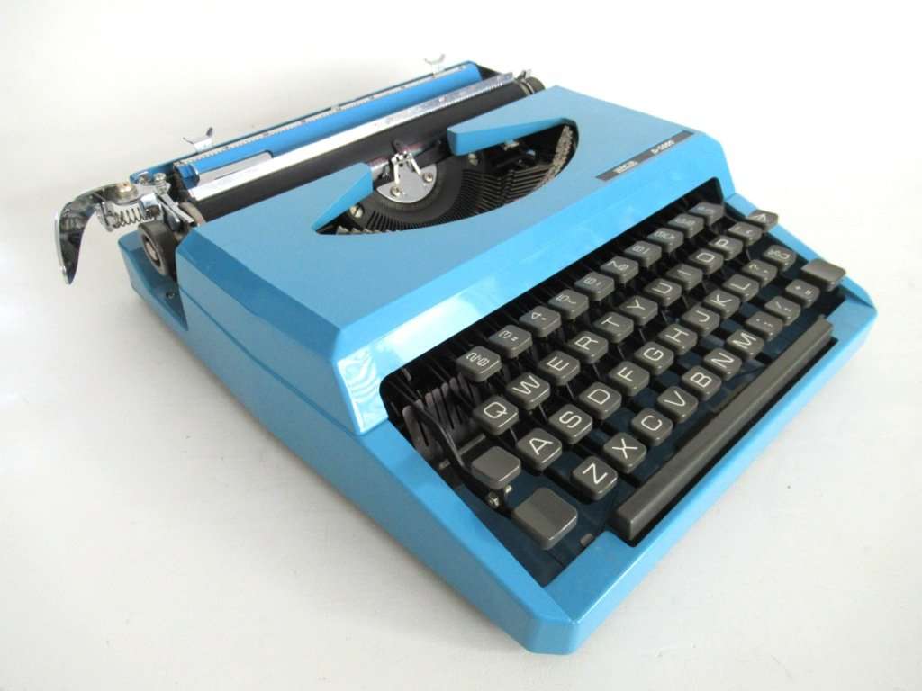 Light Blue Lancia Typewriter 1970's QWERTY keyboard. Working blue type ...