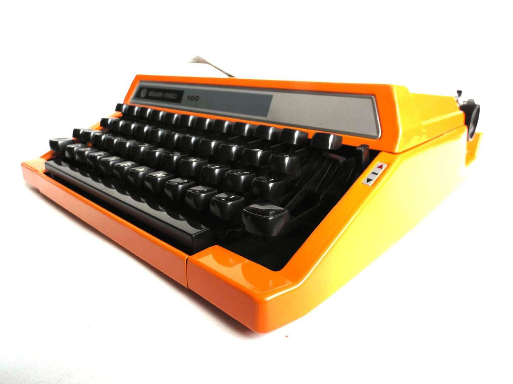 1970's Orange typewriter, Silver-Reed SR 100 working typewriter made i ...