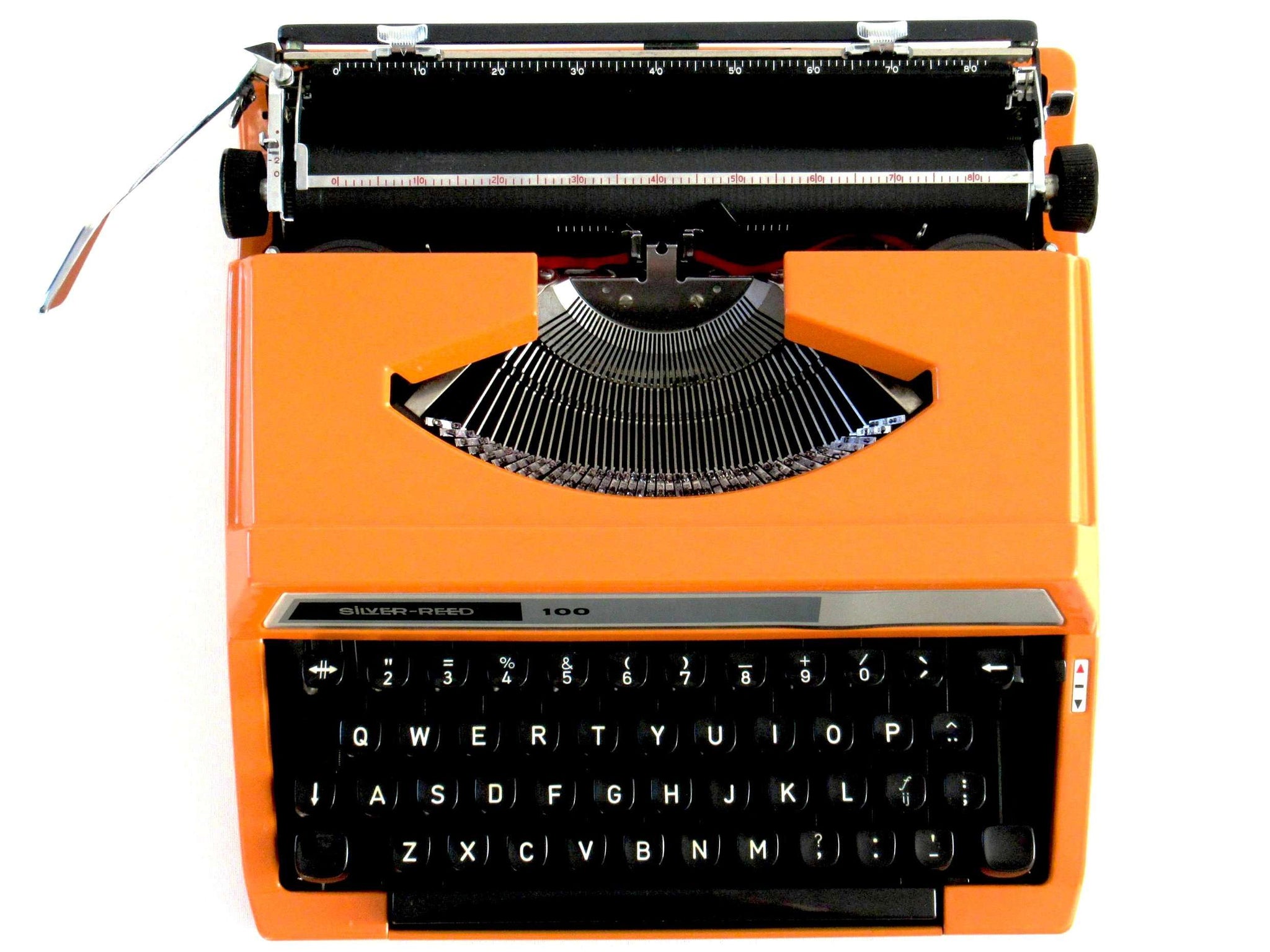 Silver-Reed 100 working typewriter made in 1976. 1970's Orange typewri ...